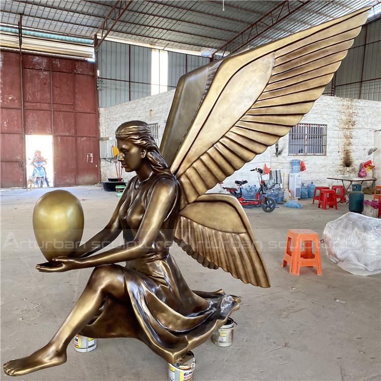 Kneeling Angel with Ball